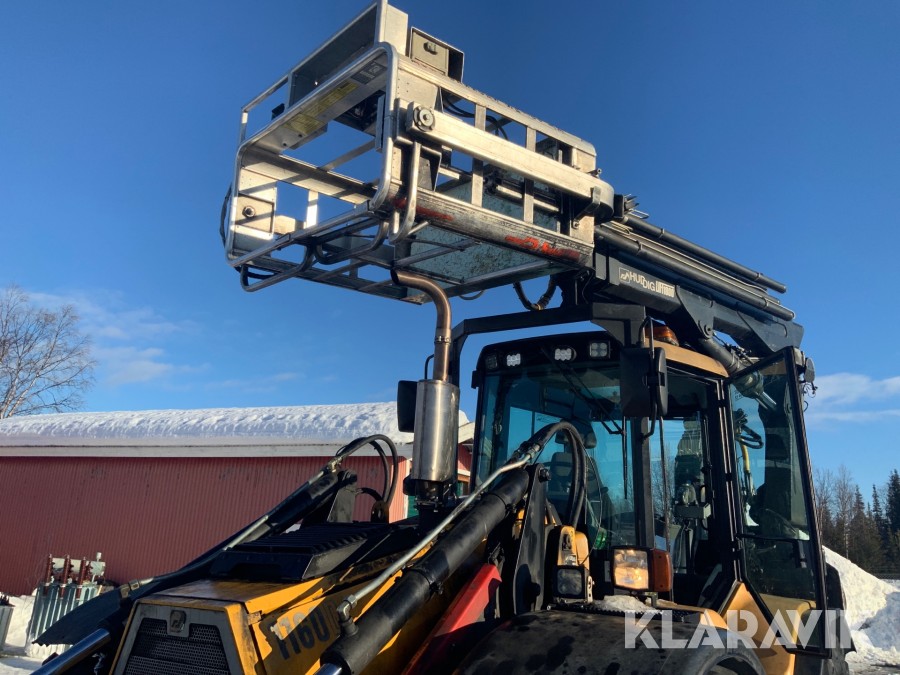 Traktorgrävare linjemaskin Huddig 1160D Med personkorg