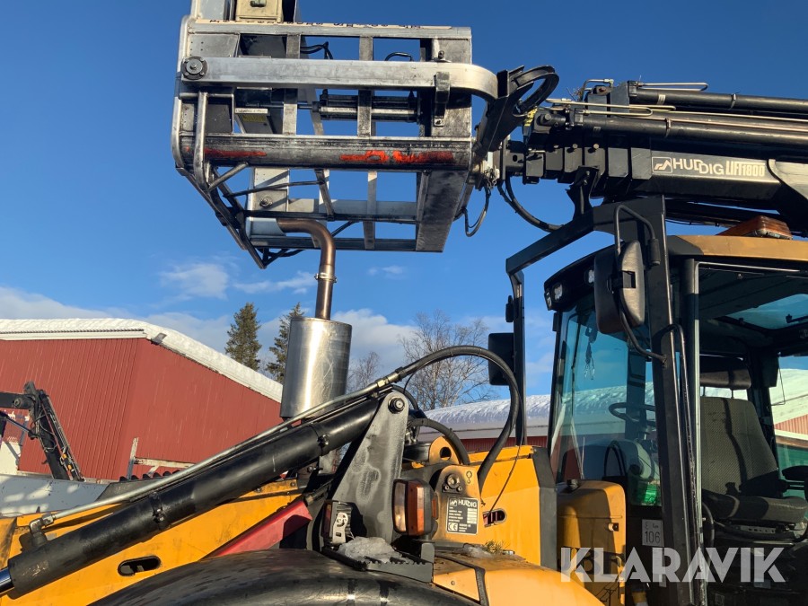Traktorgrävare linjemaskin Huddig 1160D Med personkorg