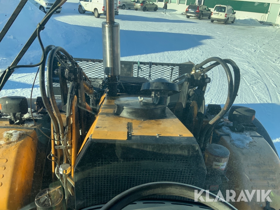 Traktorgrävare linjemaskin Huddig 1160D Med personkorg