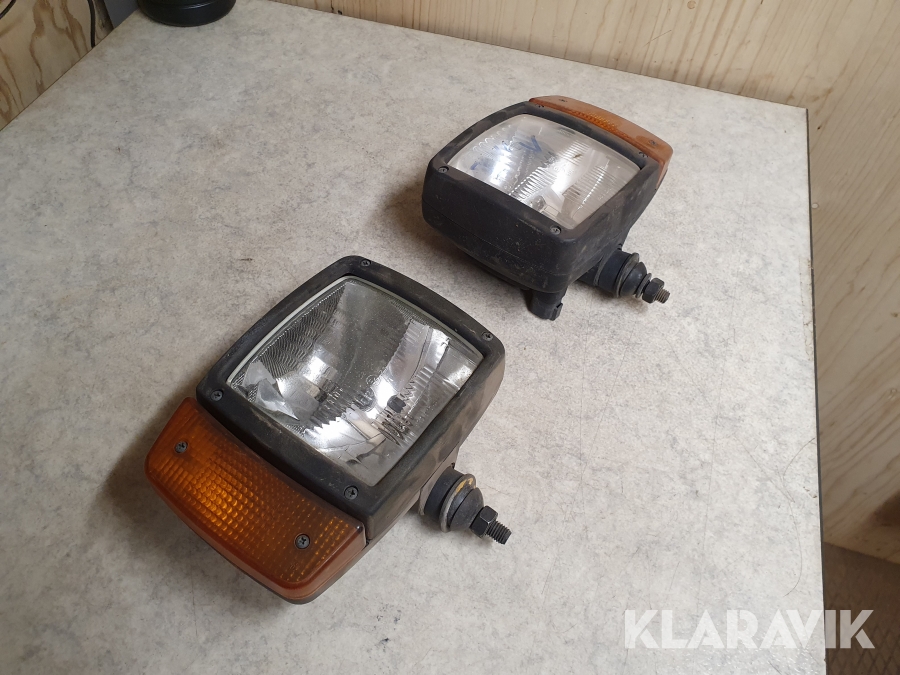 Strålkastare Hella frontlykta med blinkers till hjullastare 1 par