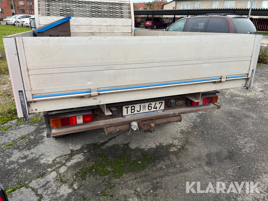 Flakbil Ford Transit 125 T330, Gotland, Klaravik auktioner