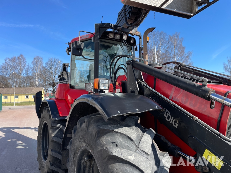 Grävlastare Huddig 1260B, Kil, Klaravik auktioner