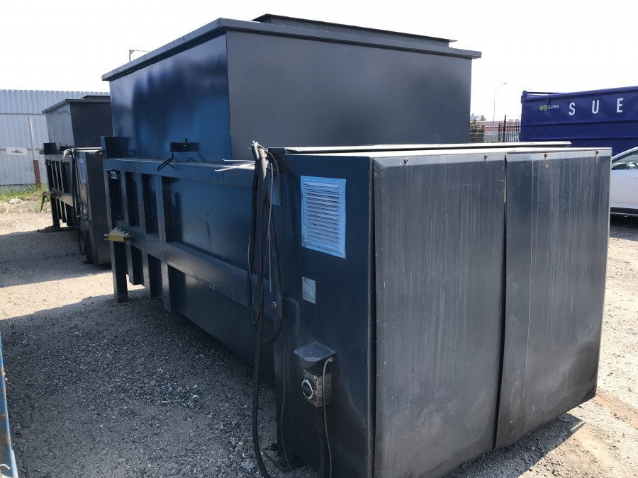 Komprimator med container