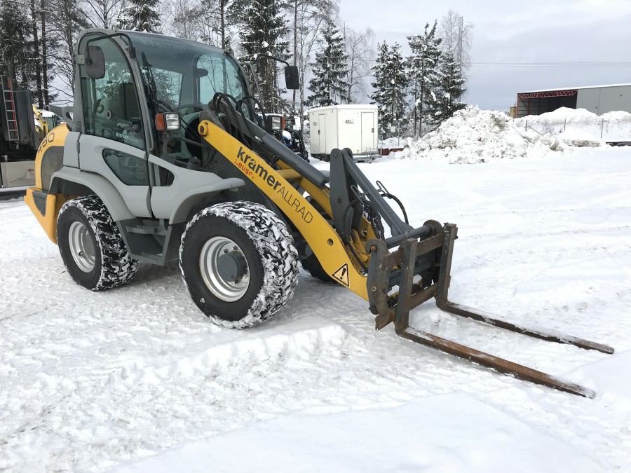 Lastmaskin med skopa & gafflar