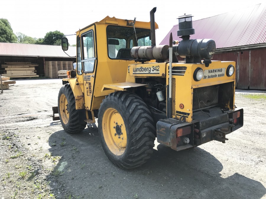 Lastmaskin med skopa & gafflar