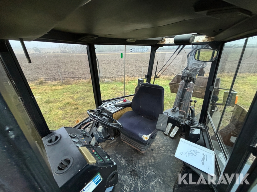 Traktorgrävare Huddig 960, Svalöv, Klaravik auktioner